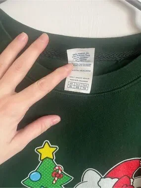 Hello Kitty | Tops | Hello Kitty Dark Green Holiday Crewneck Sweatshirt ...